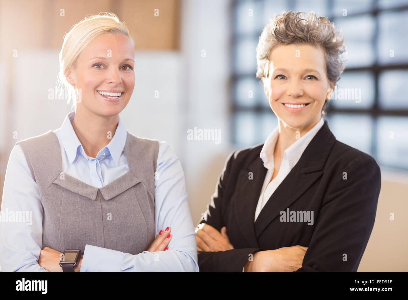 Businesswomen smiling hi-res stock photography and images - Alamy