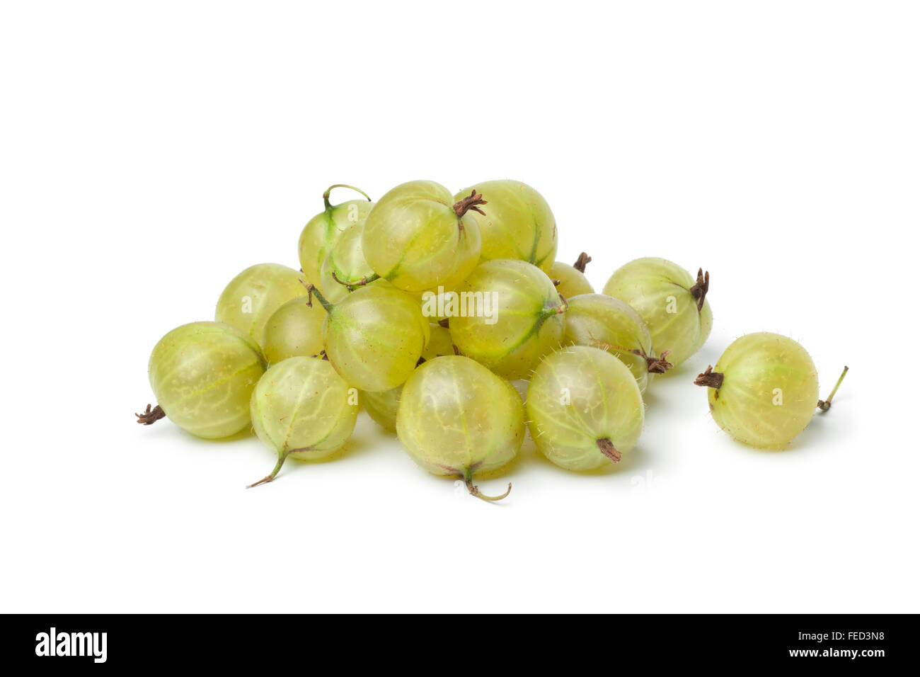 Heap of fresh green Gooseberries on white background Stock Photo - Alamy
