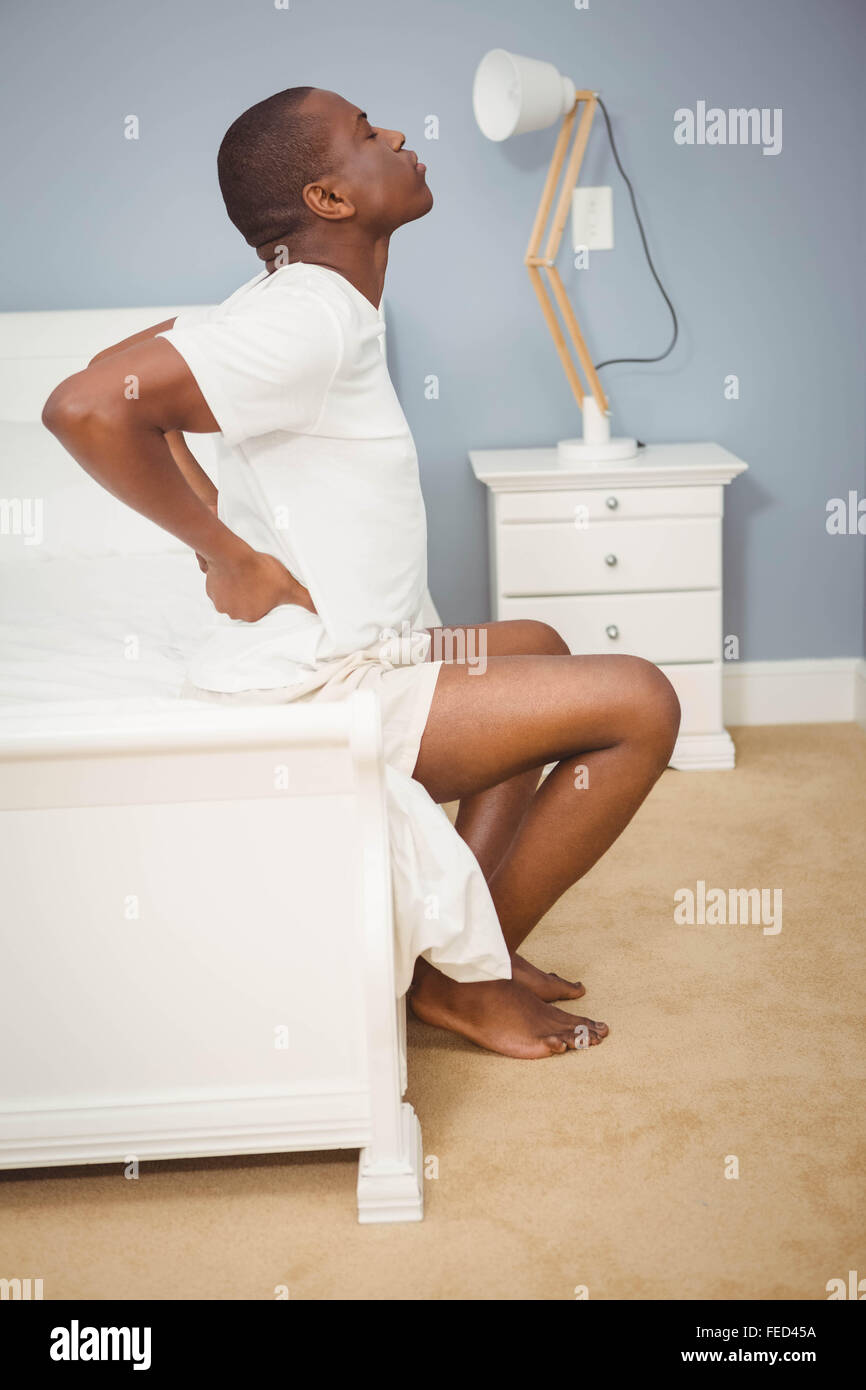 Man having back pain Stock Photo - Alamy