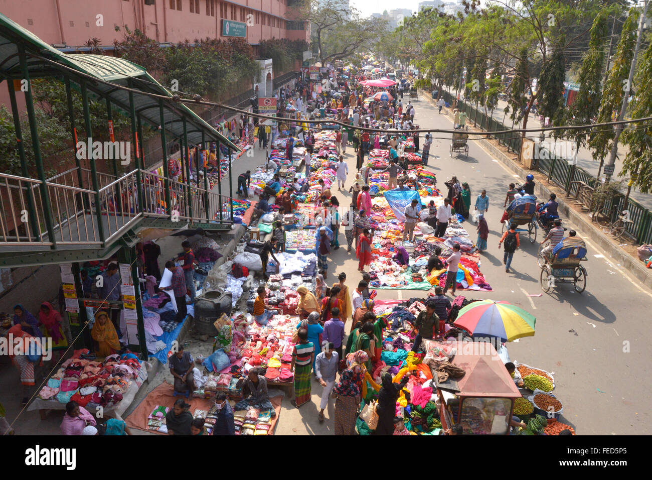 Dhaka, Bangladesh. 5th February, 2016. Bangladeshi clothes vendors are ...