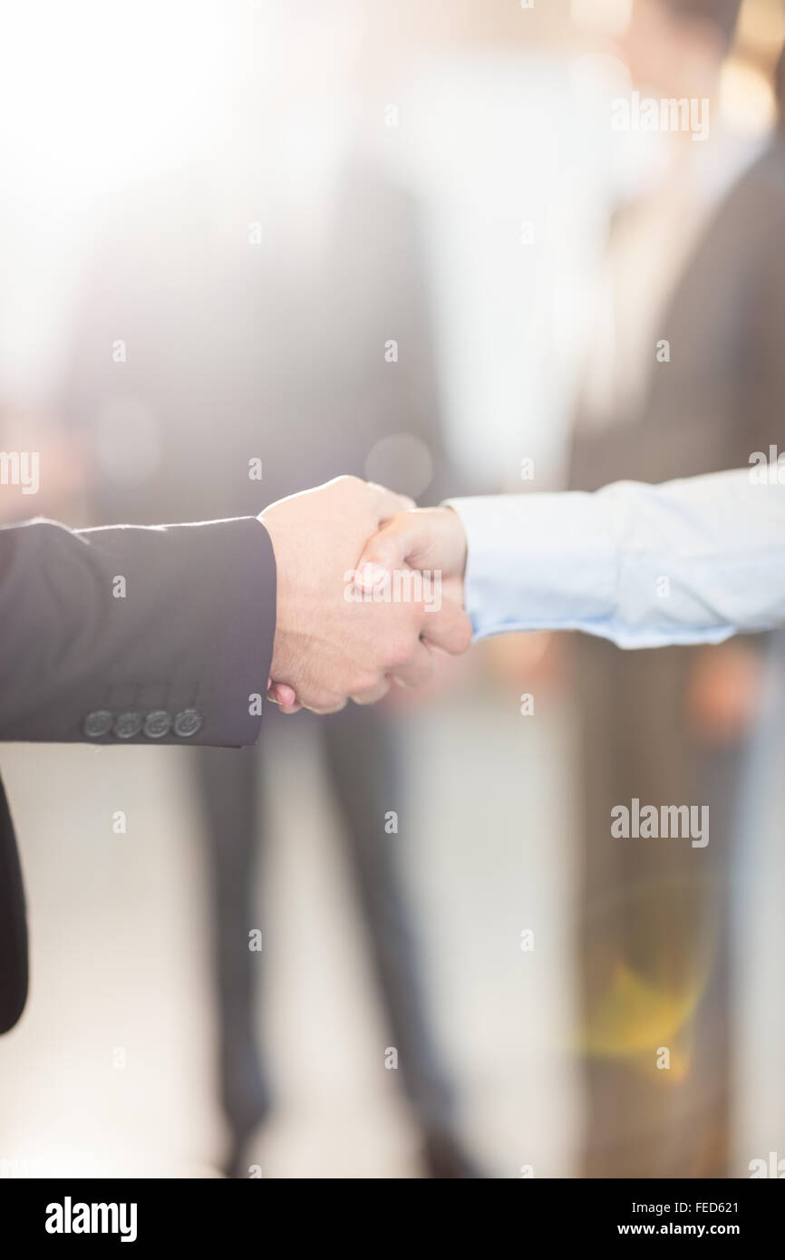 Business team shaking hands close up Stock Photo - Alamy