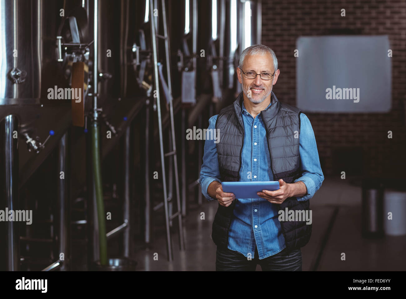 Portrait brewery man tablet hi-res stock photography and images - Alamy