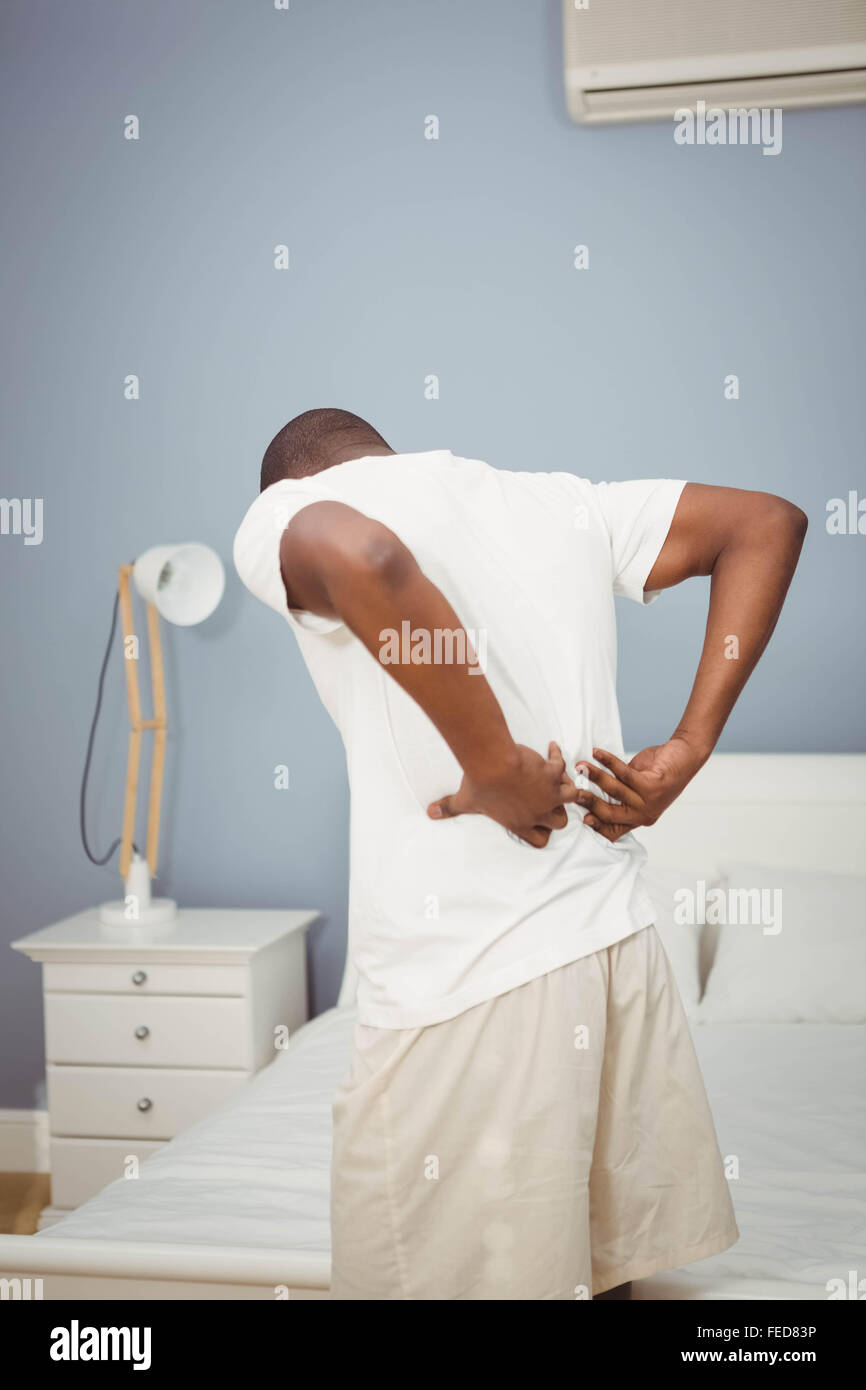 Man having back pain Stock Photo - Alamy