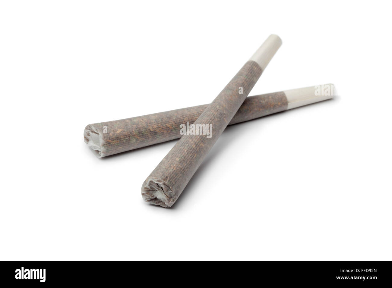 Two reefers ready to smoke on white background Stock Photo - Alamy