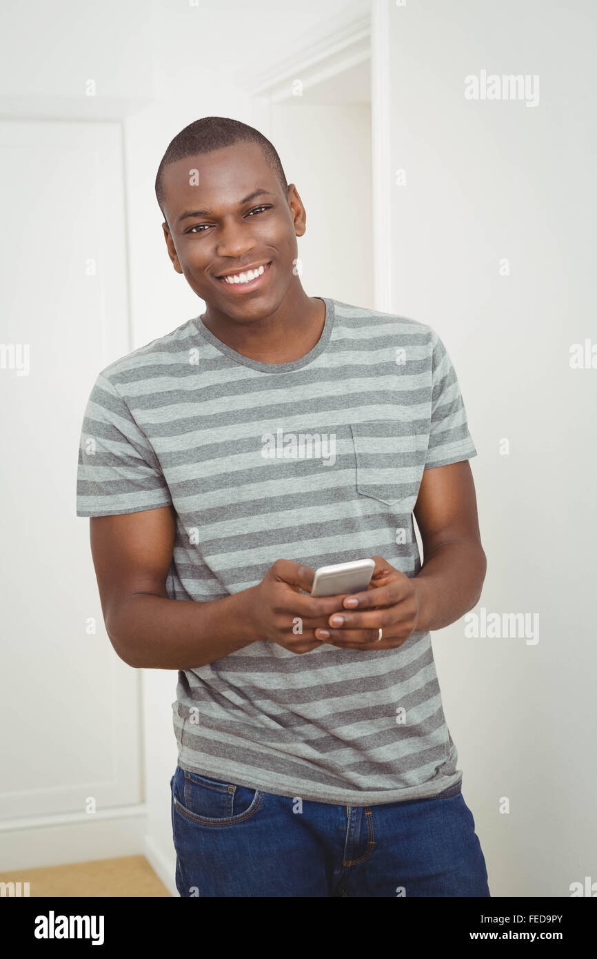 Handsome man texting Stock Photo - Alamy