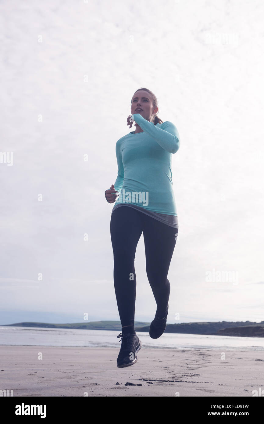 Fit brunette make a run Stock Photo - Alamy