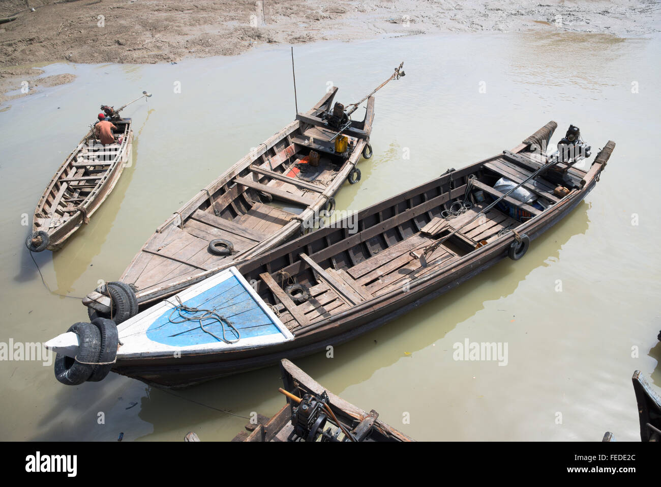 Group of traditional wooden boats moored at Tanintharyi River, Myeik in ...
