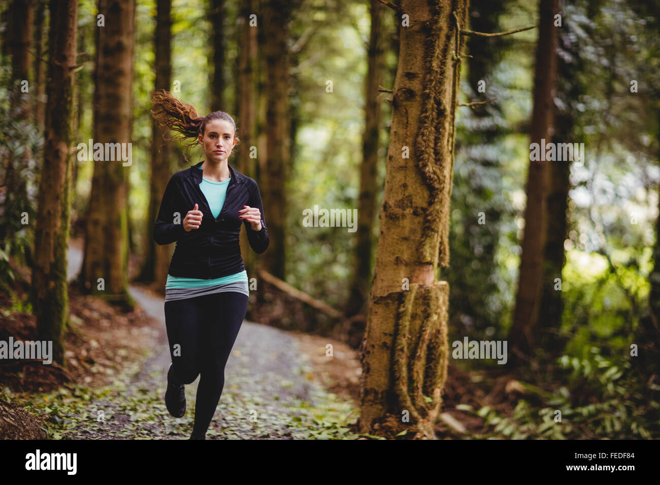 Pretty caucasian brunette runner woman hi-res stock photography and ...