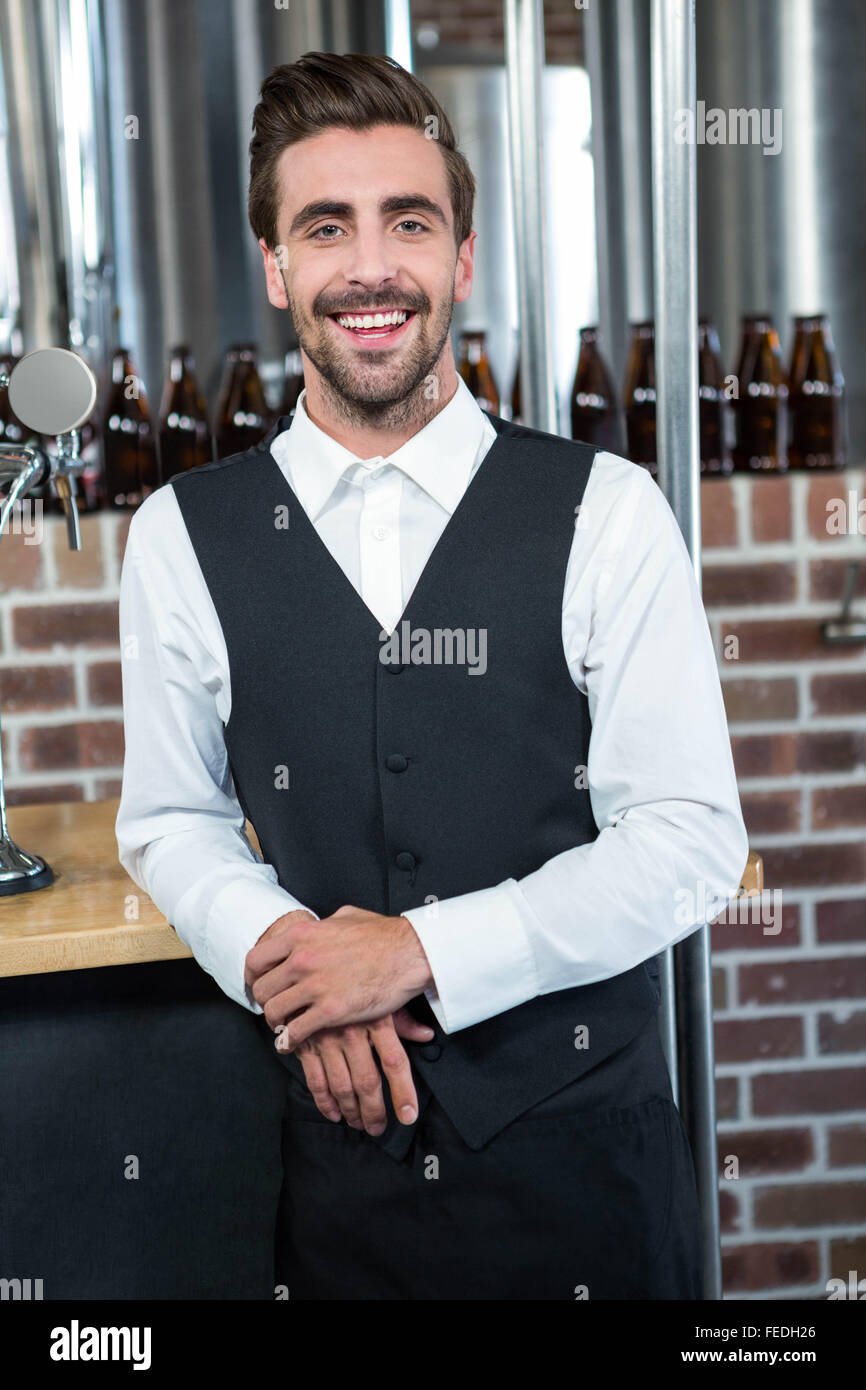 Male bartender leaning on bar hi-res stock photography and images - Alamy