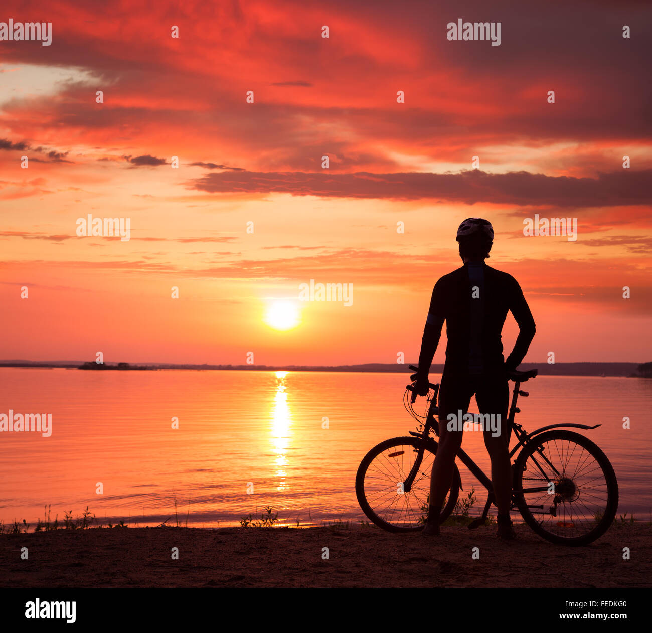 Biker standing at back wheel hi-res stock photography and images - Alamy