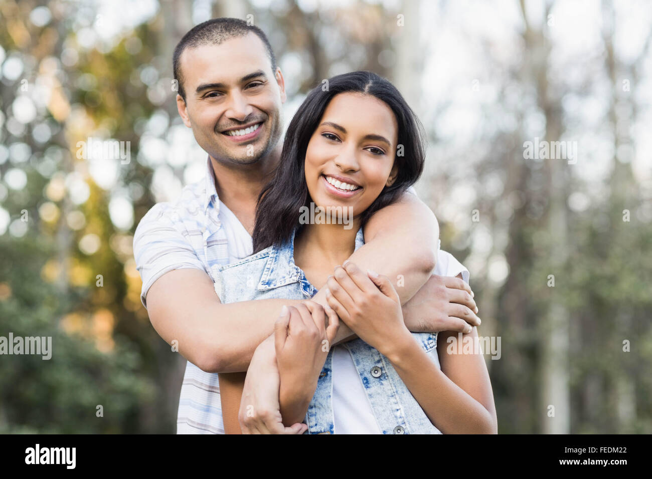 Cute couple hugging Stock Photo - Alamy