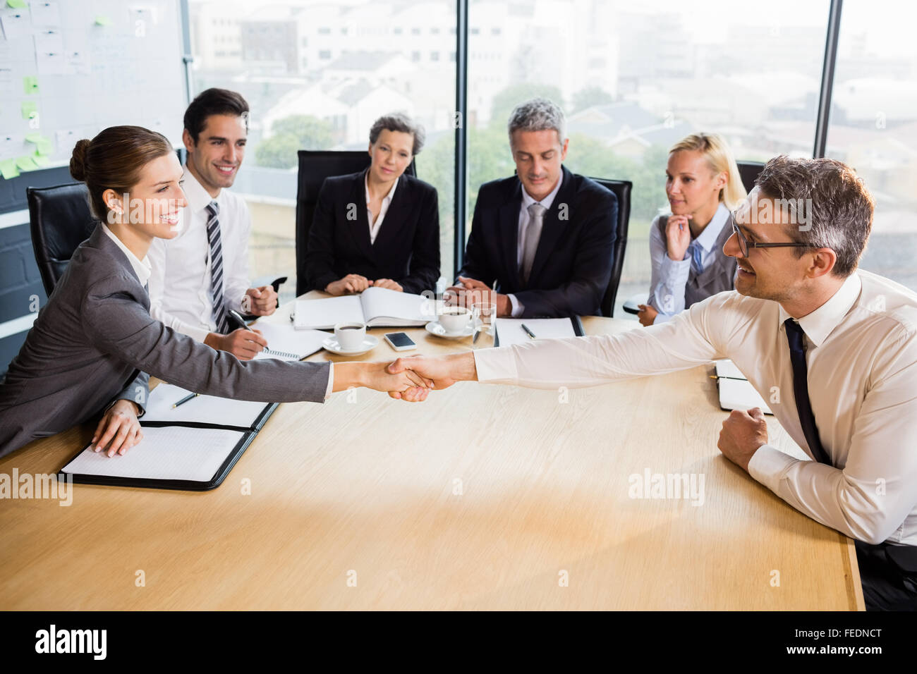 Business team having a meeting Stock Photo - Alamy