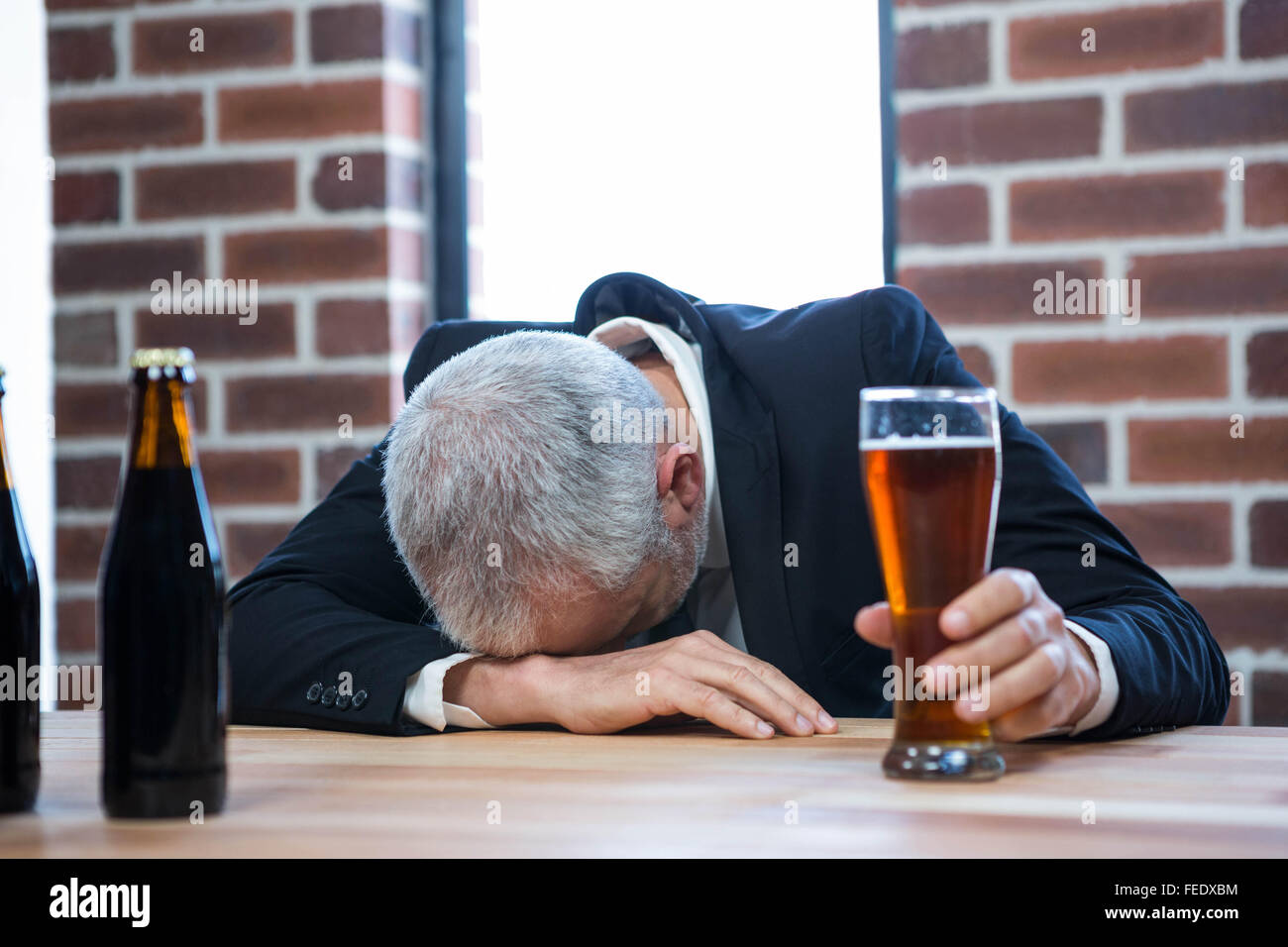 Businessman leaning on bar counter hi-res stock photography and images ...