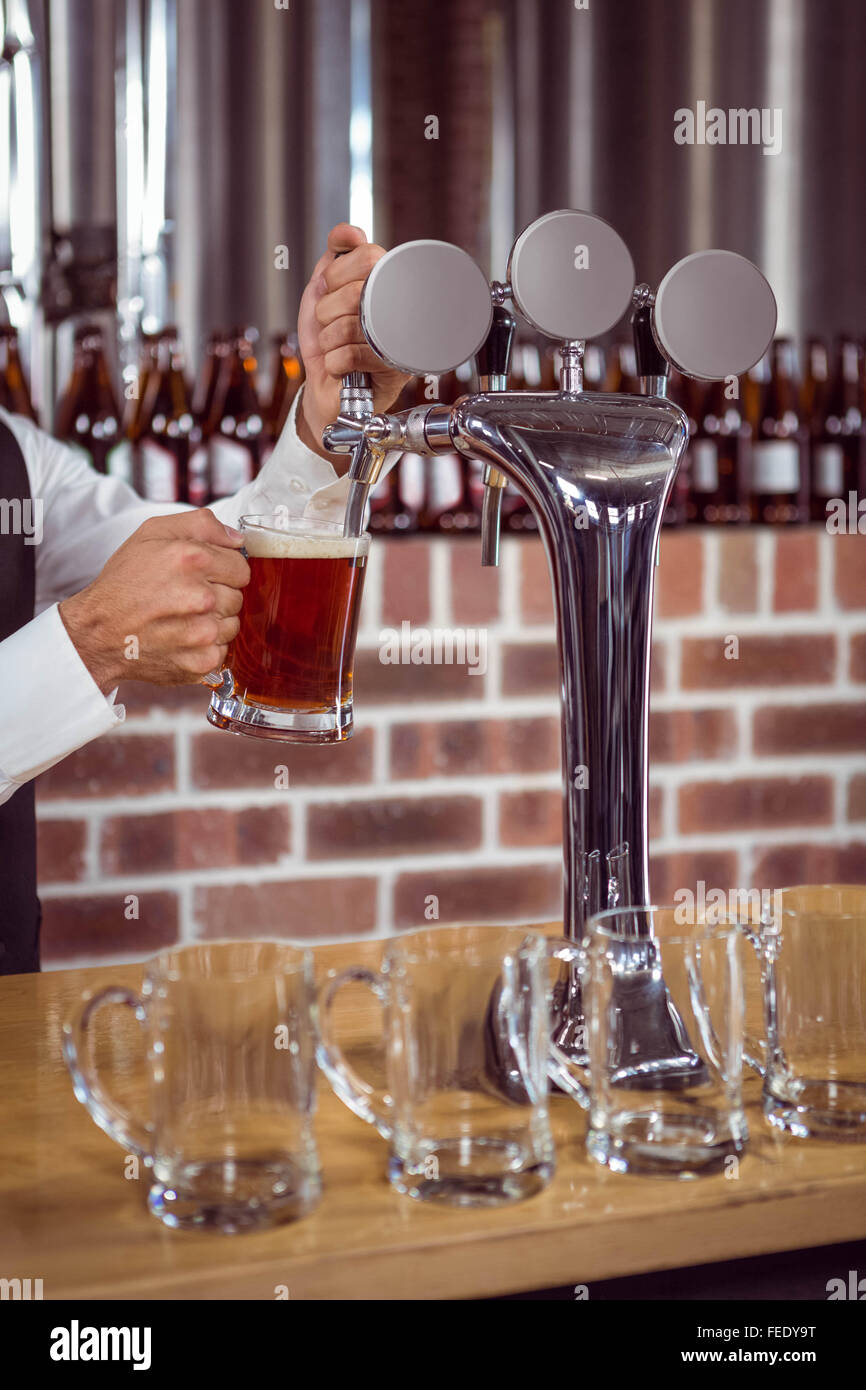 Barman pulling a pint of beer Stock Photo - Alamy