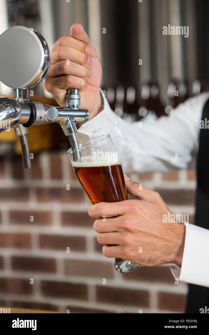 Barman pulling a pint of beer Stock Photo - Alamy