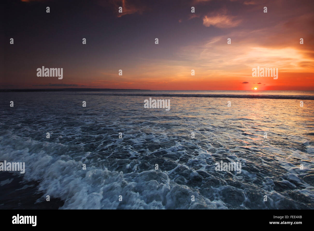Beautiful view on sea under sunset sky on Bali Stock Photo - Alamy