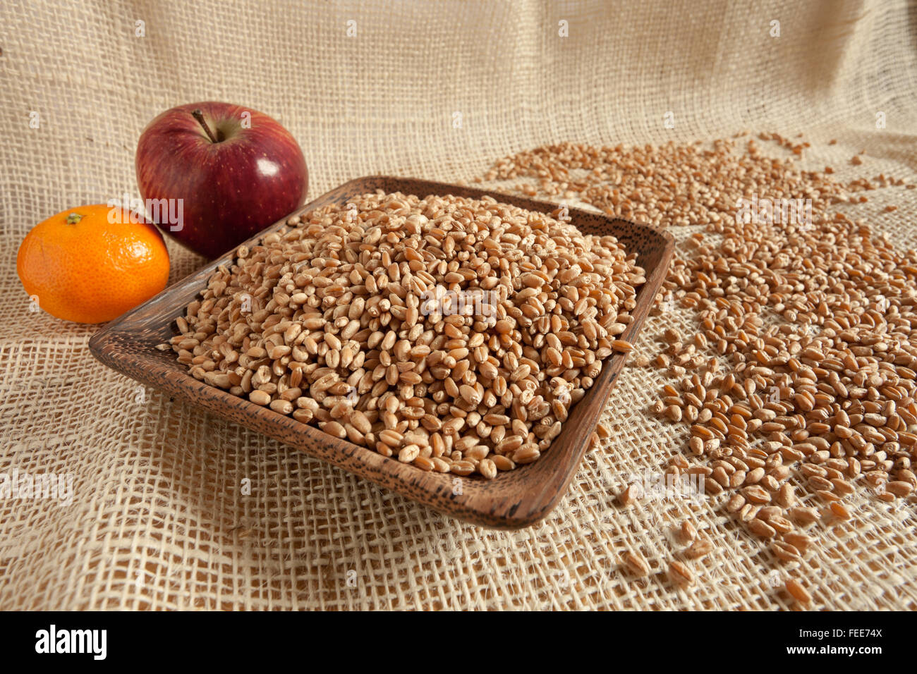 wheat as natural food inside a wooden cup, country style Stock Photo ...