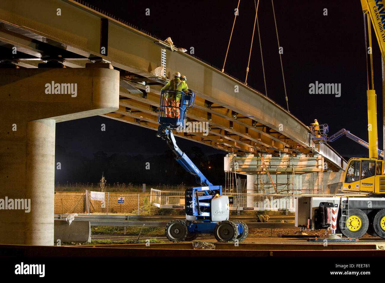 workers bridge construction building cherry picker Stock Photo - Alamy