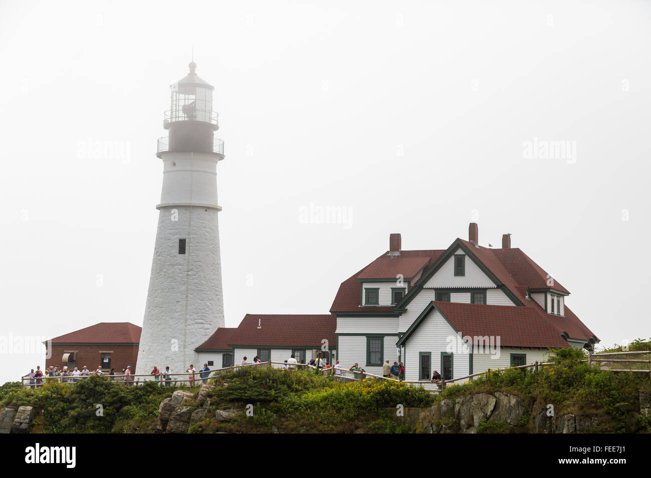 The famous Portland Head lighthouse in heavy fog Stock Photo - Alamy