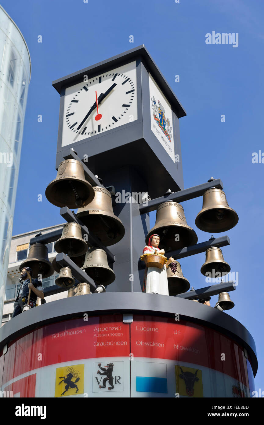 A modern clock with traditional bells by the Swiss symbol in Leicester ...