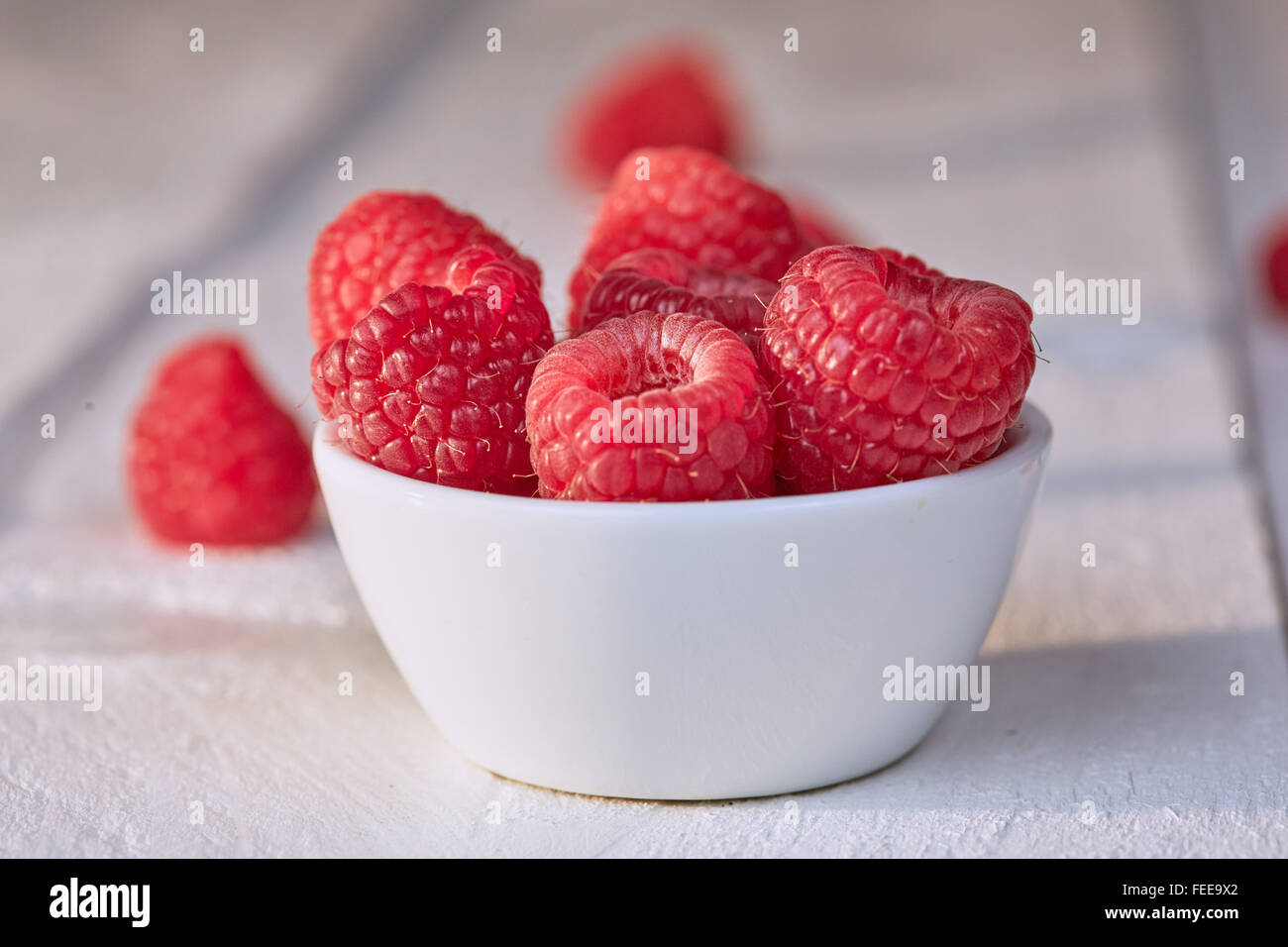 Healthy diet vitamin snack with red ripe raspberries Stock Photo - Alamy