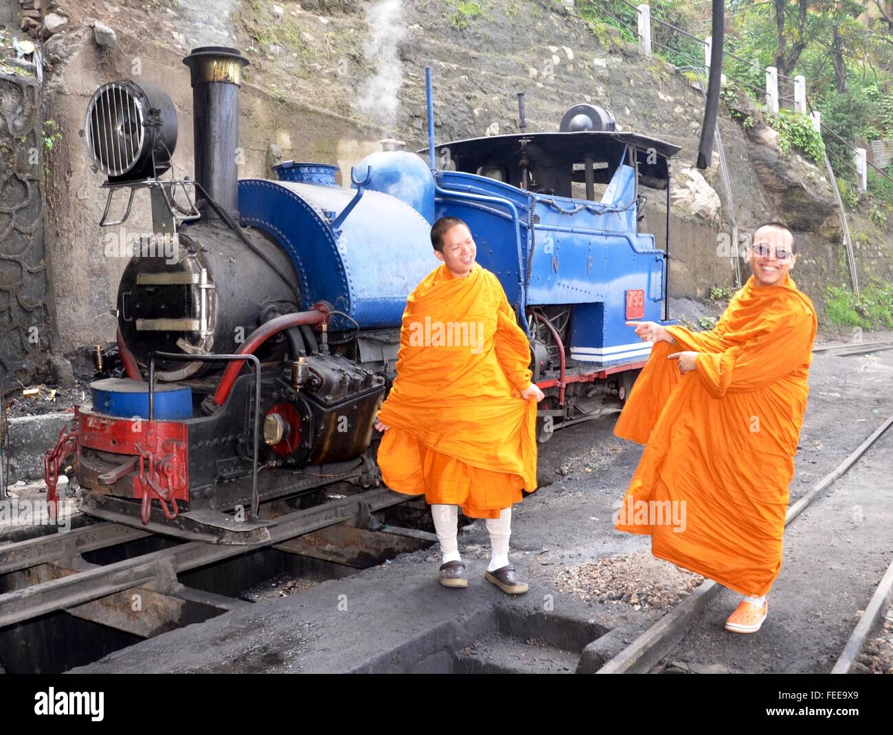 Buddhist Monks on vacation Darjeeling Himalayan Railway Stock Photo - Alamy