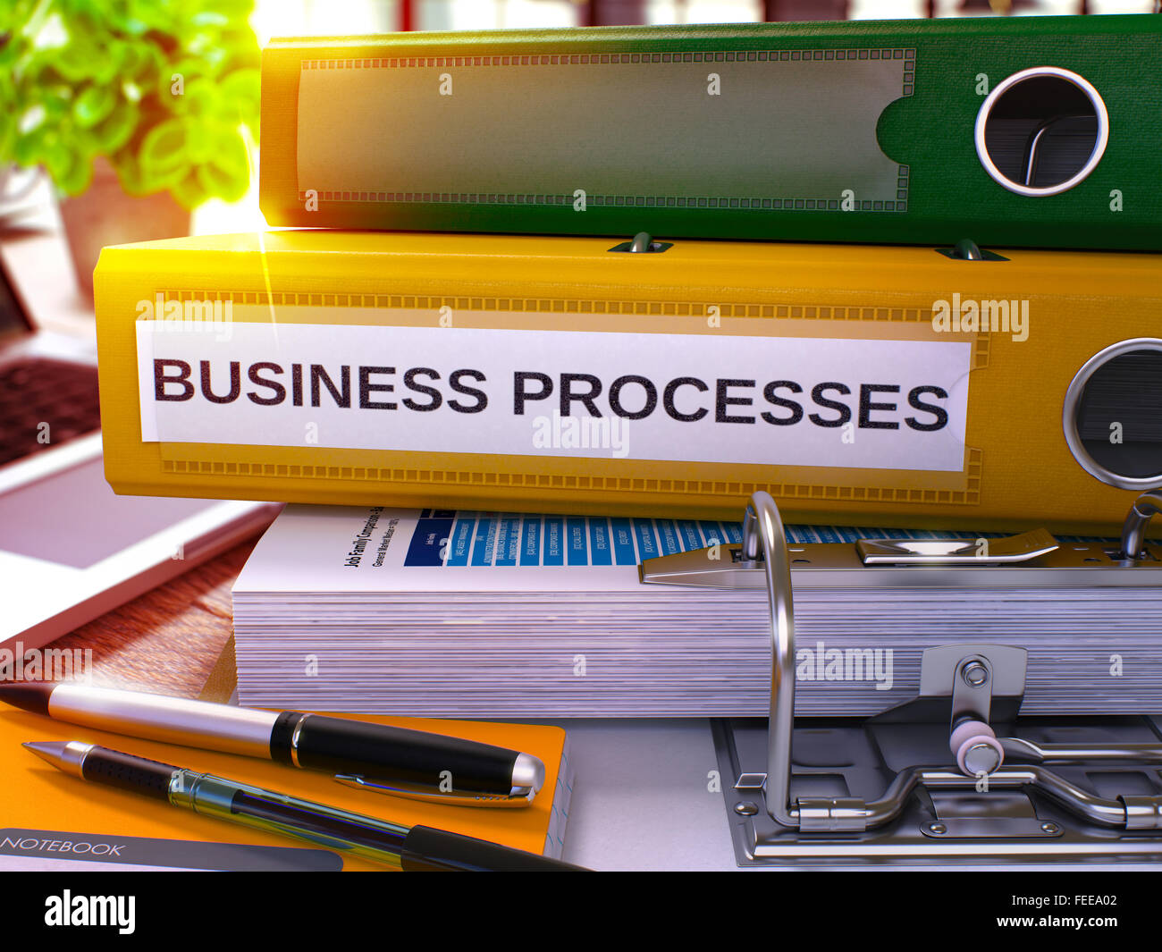 Business Processes on Yellow Office Folder. Toned Image Stock Photo - Alamy