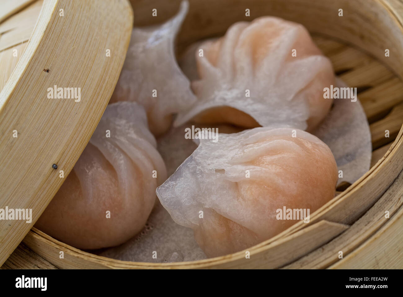 Dim Sum traditional chinese starter in bamboo basket Stock Photo - Alamy