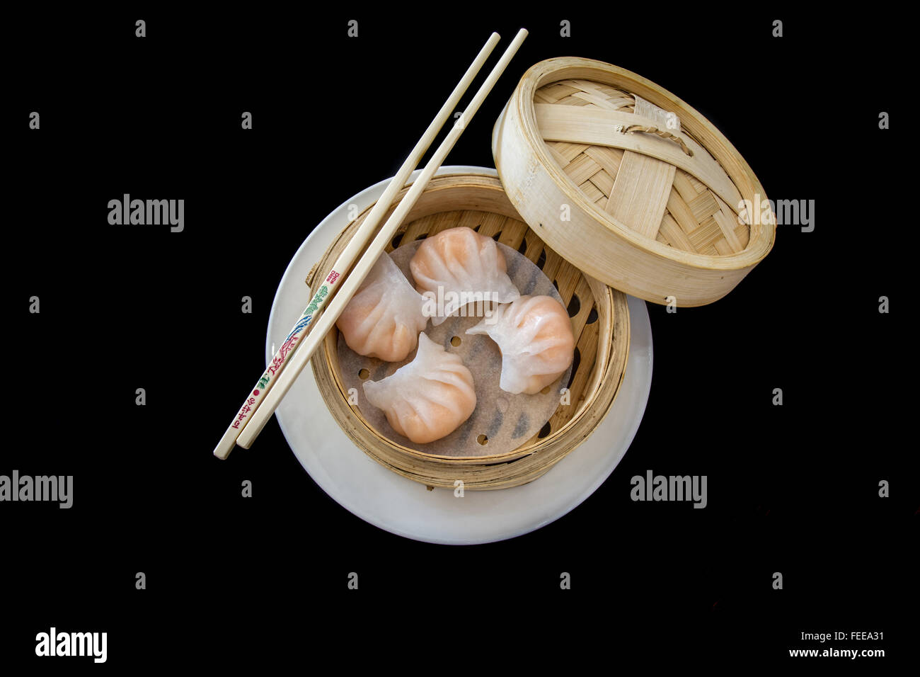 Dim Sum traditional chinese starter on black background Stock Photo - Alamy