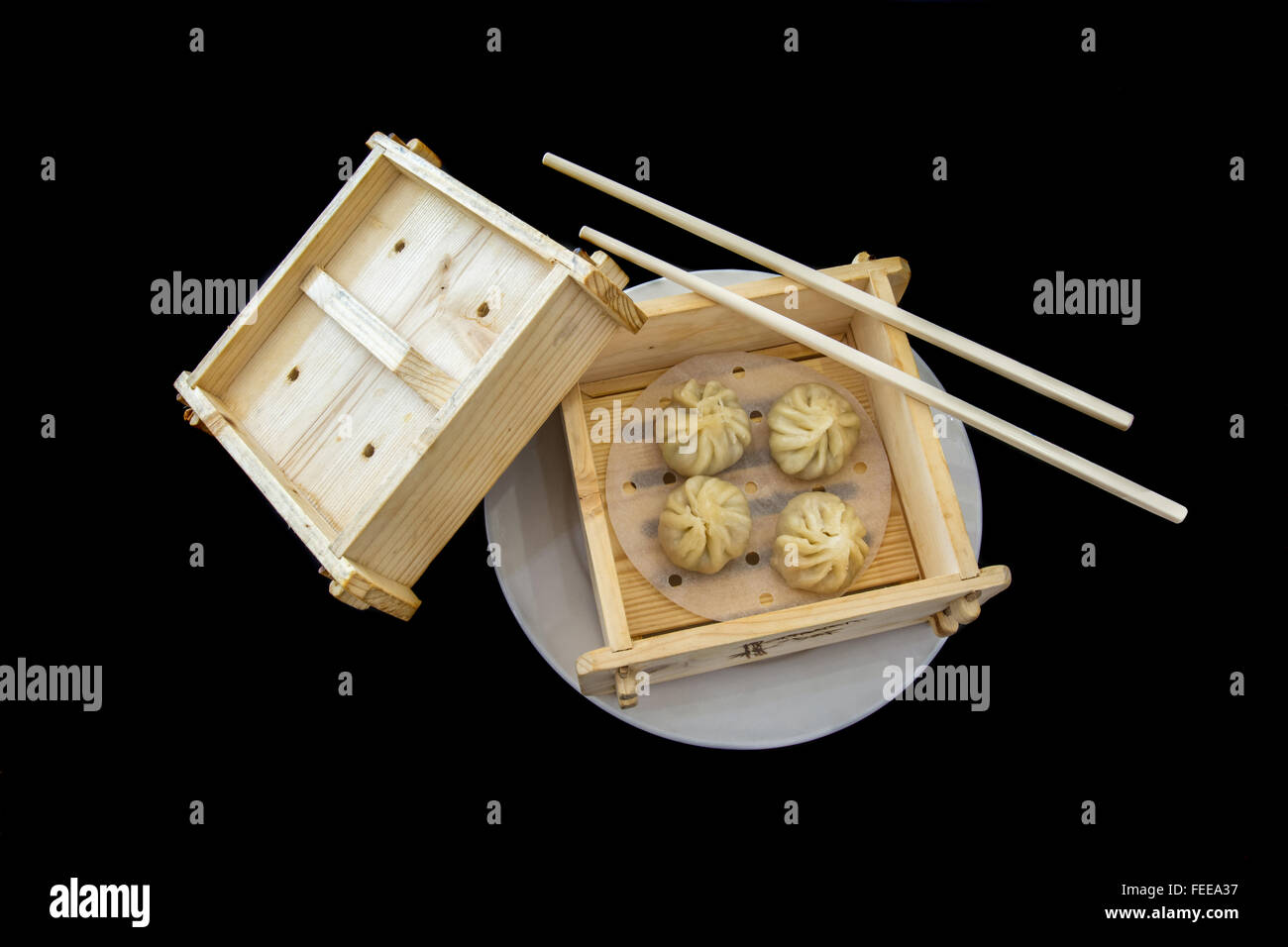 Dim Sum traditional chinese starter on black background Stock Photo - Alamy