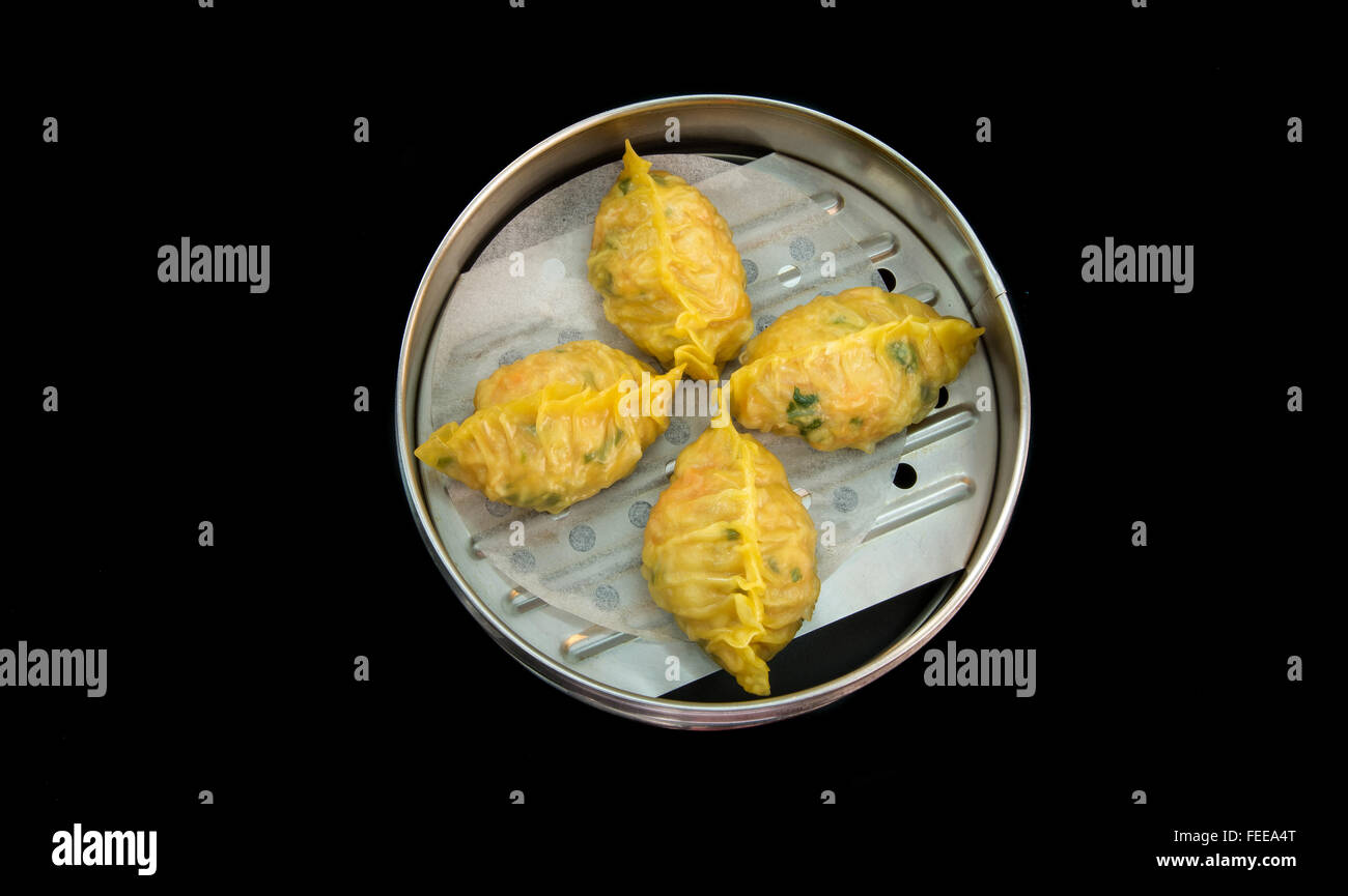 Dim Sum traditional chinese starter on black background Stock Photo - Alamy