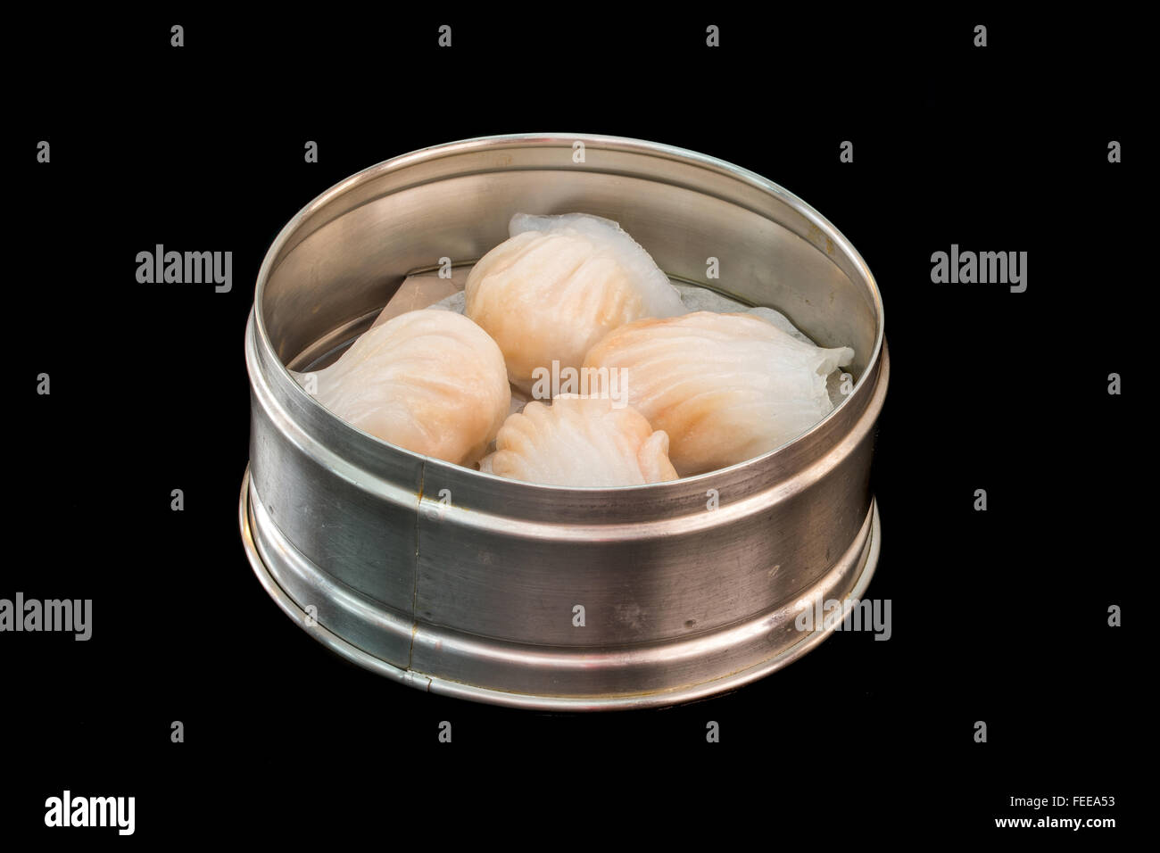 Dim Sum traditional chinese starter on black background Stock Photo - Alamy