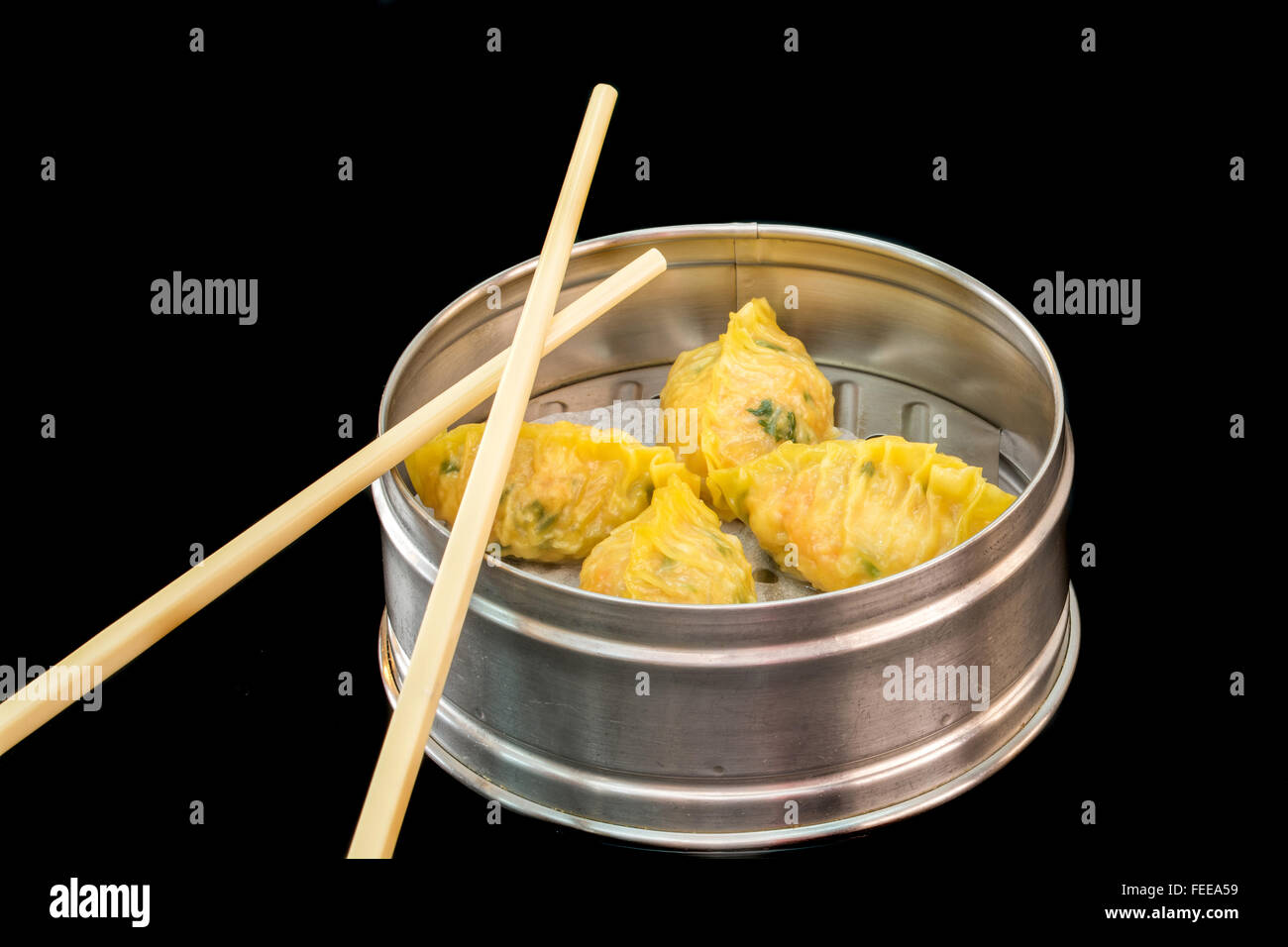 Dim Sum traditional chinese starter on black background Stock Photo - Alamy