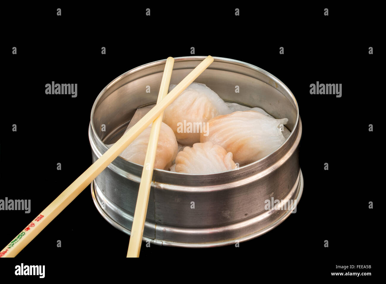 Dim Sum traditional chinese starter on black background Stock Photo - Alamy