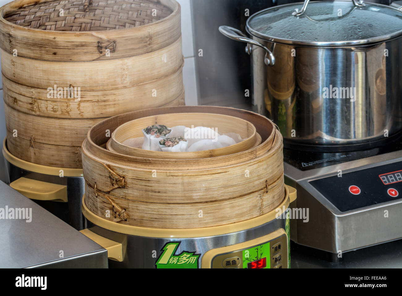 cooking dim sum on steam traditional chinese starter Stock Photo - Alamy