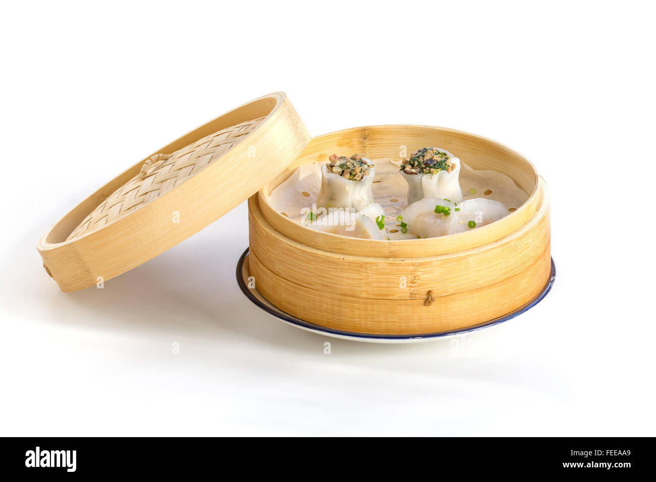 Dim Sum traditional chinese starter on white background Stock Photo - Alamy