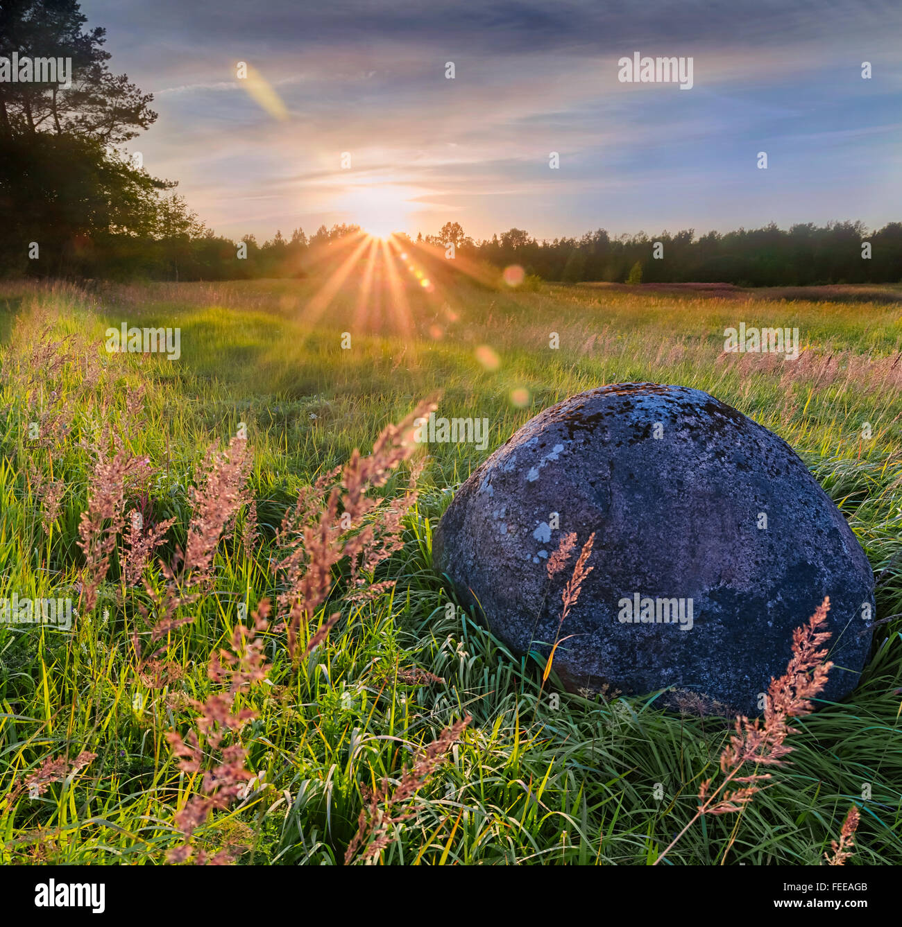 Stone at sunset Stock Photo - Alamy