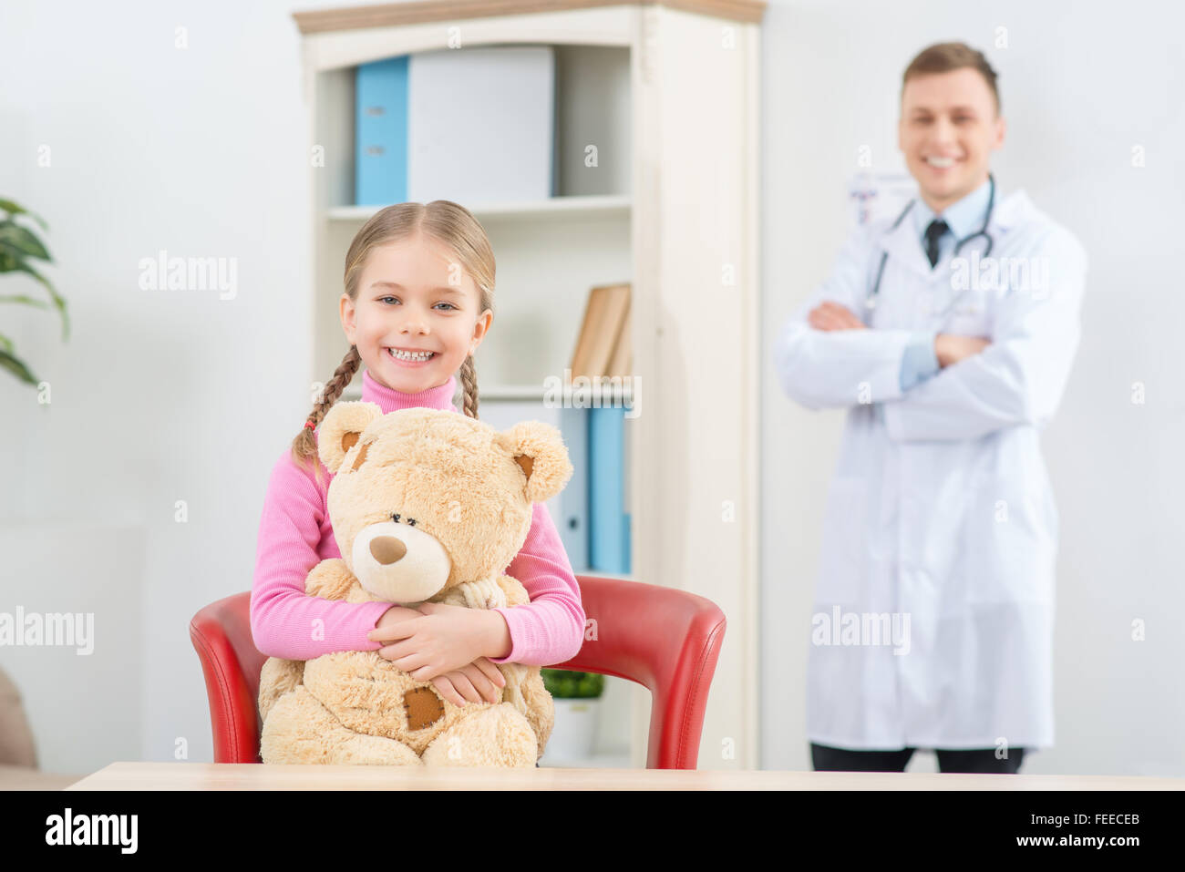 Little girl having appointment with her pediatrician Stock Photo - Alamy