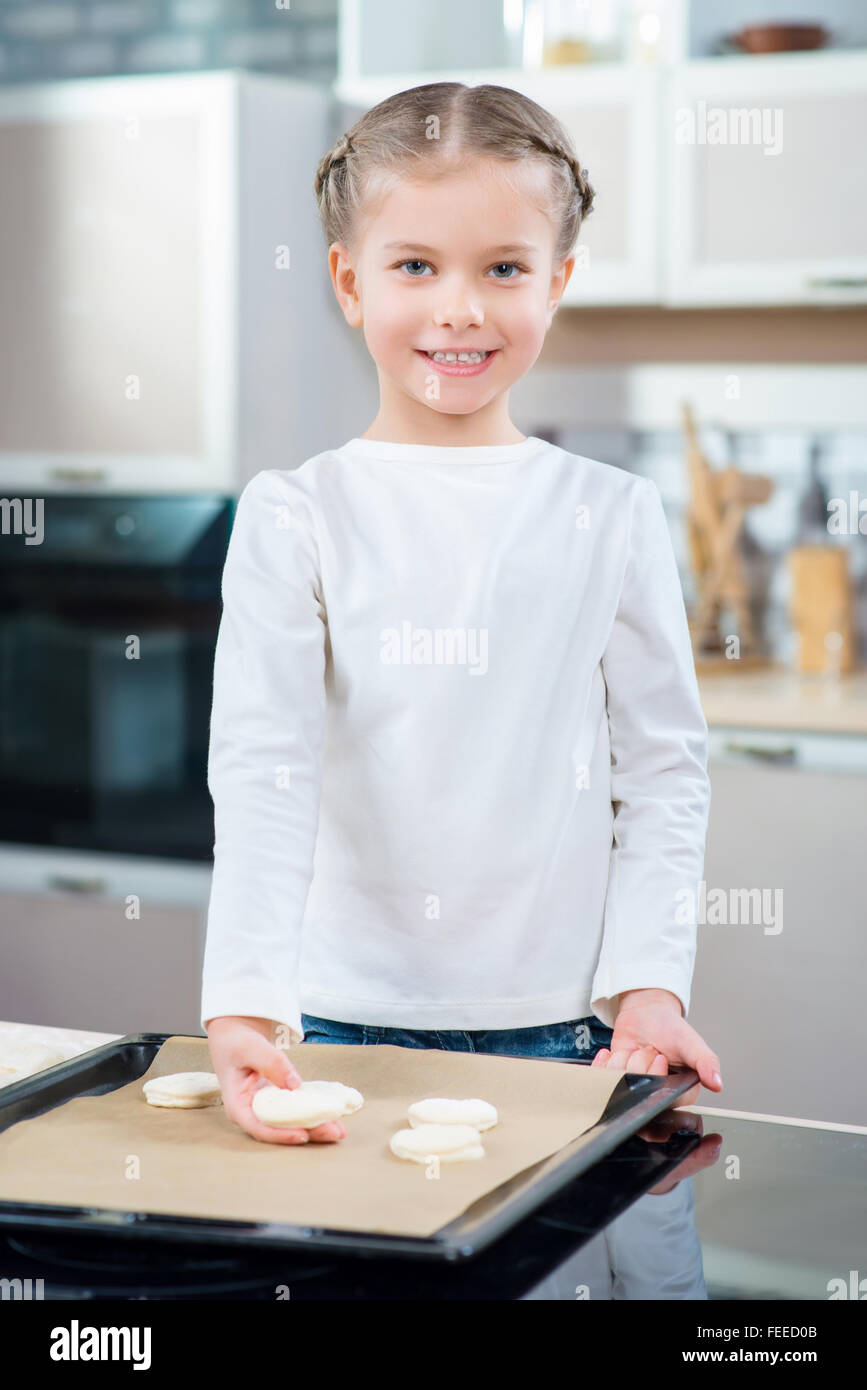 Little cute girl cooking Stock Photo - Alamy