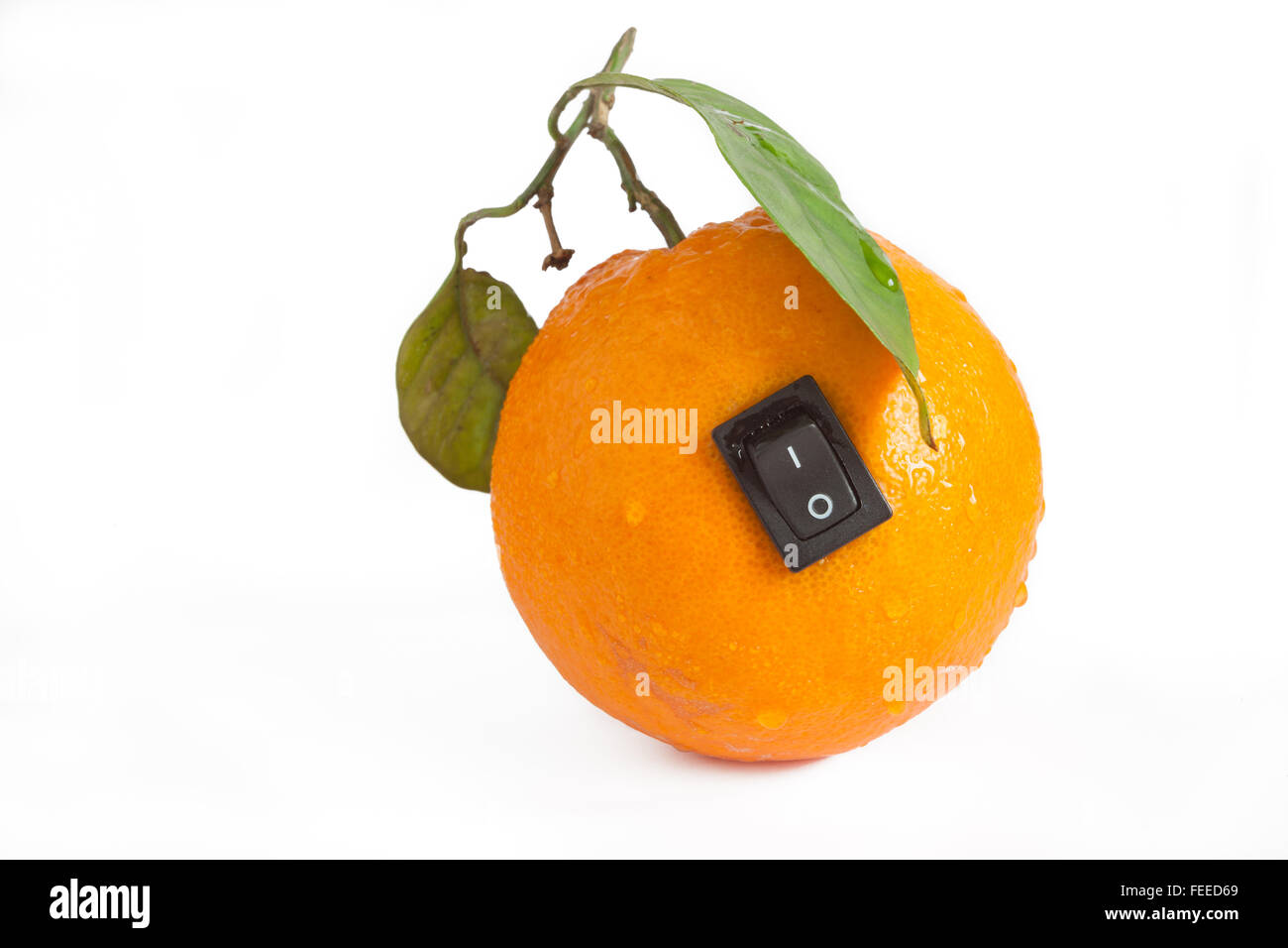 Single orange with switch in power off position on white background ...