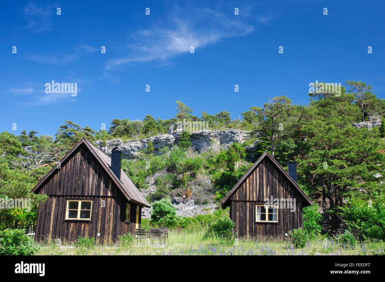 Wooden cottages in the rocky landscape of Gotland , Sweden Stock Photo ...