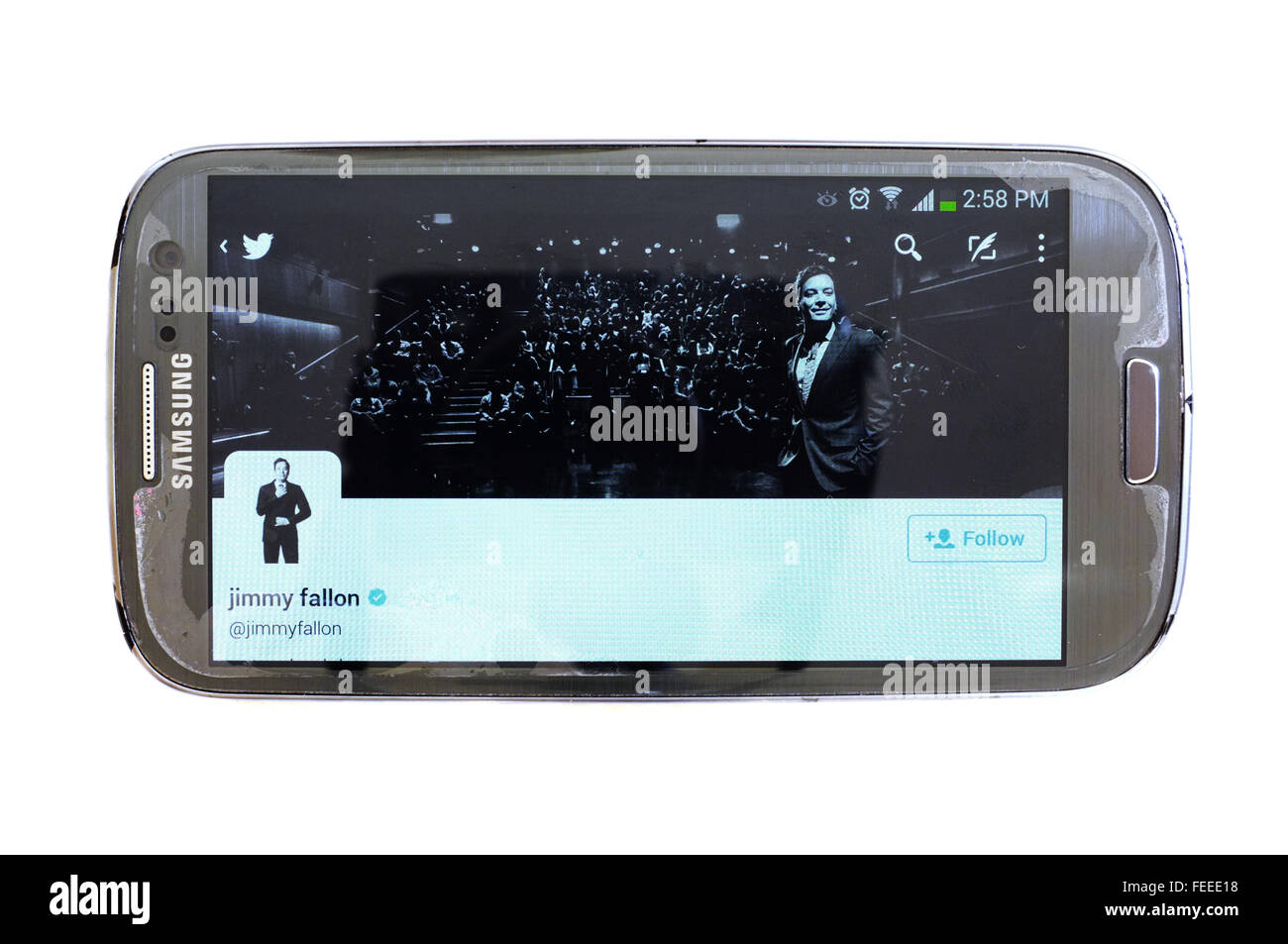 Jimmy Fallon's Twitter account on a smartphone screen photographed ...