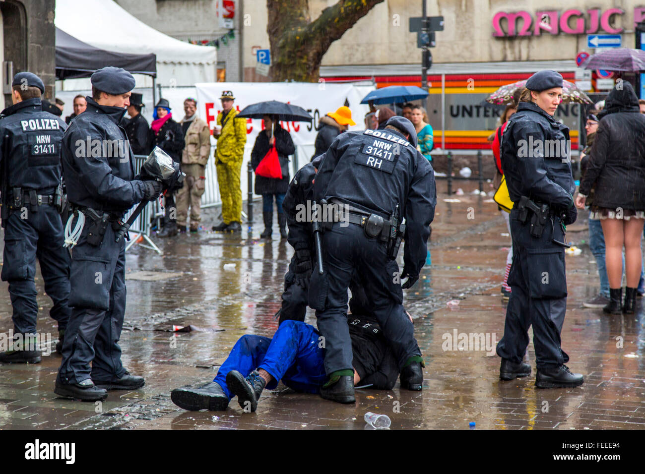 Police on duty during street carnival party in Cologne, Germany, on ...