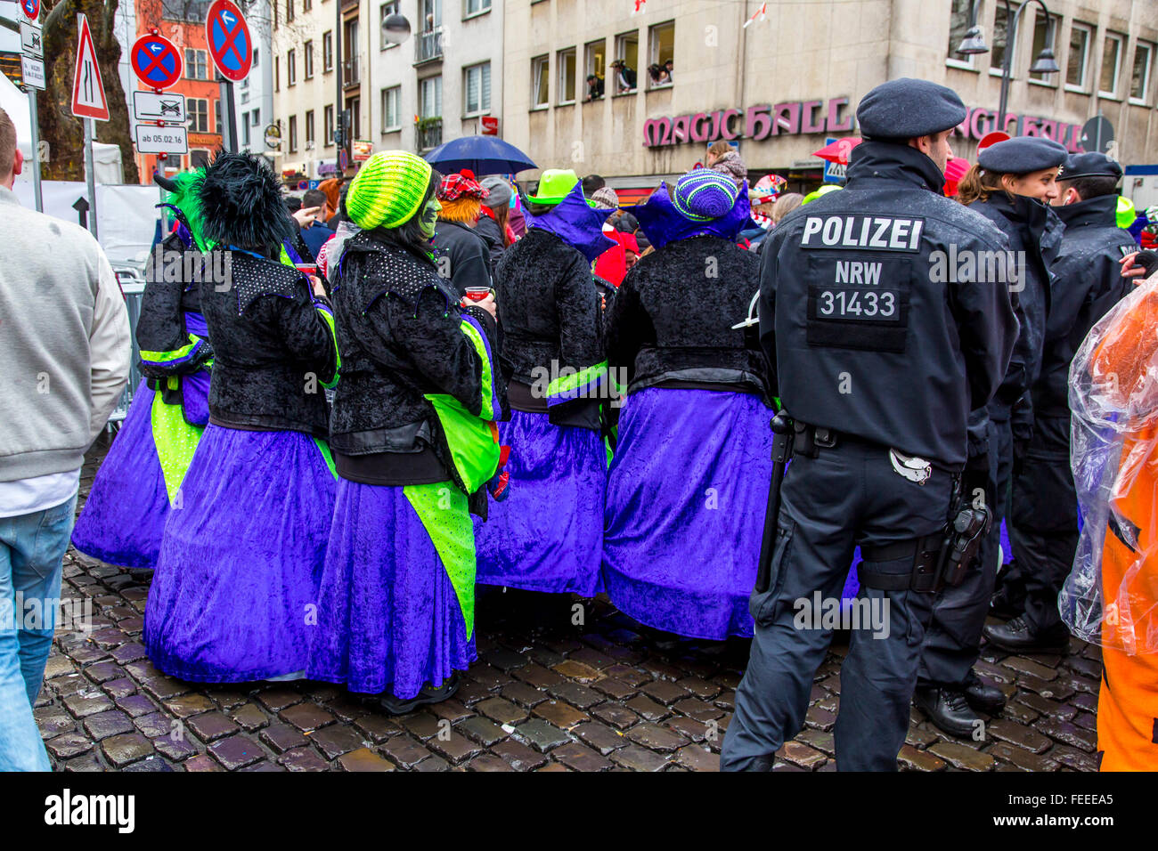 Police on duty during street carnival party in Cologne, Germany, on ...