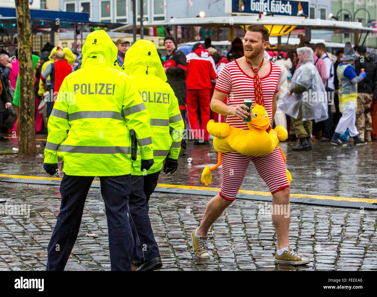 Police on duty during street carnival party in Cologne, Germany, on ...