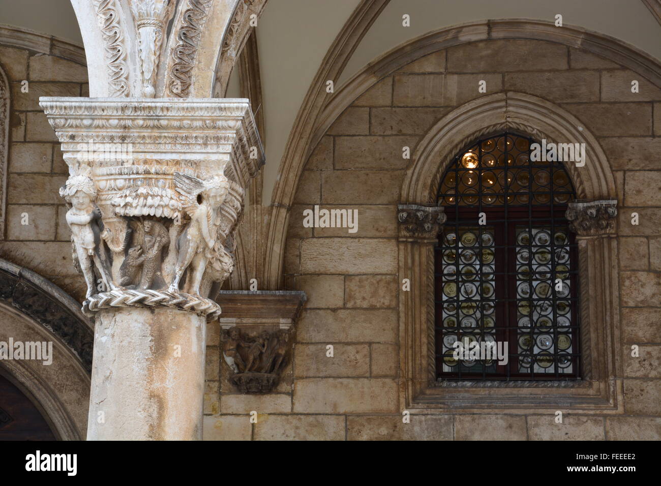 The stone columns and arches of the Rector's Palace in the Old City of ...