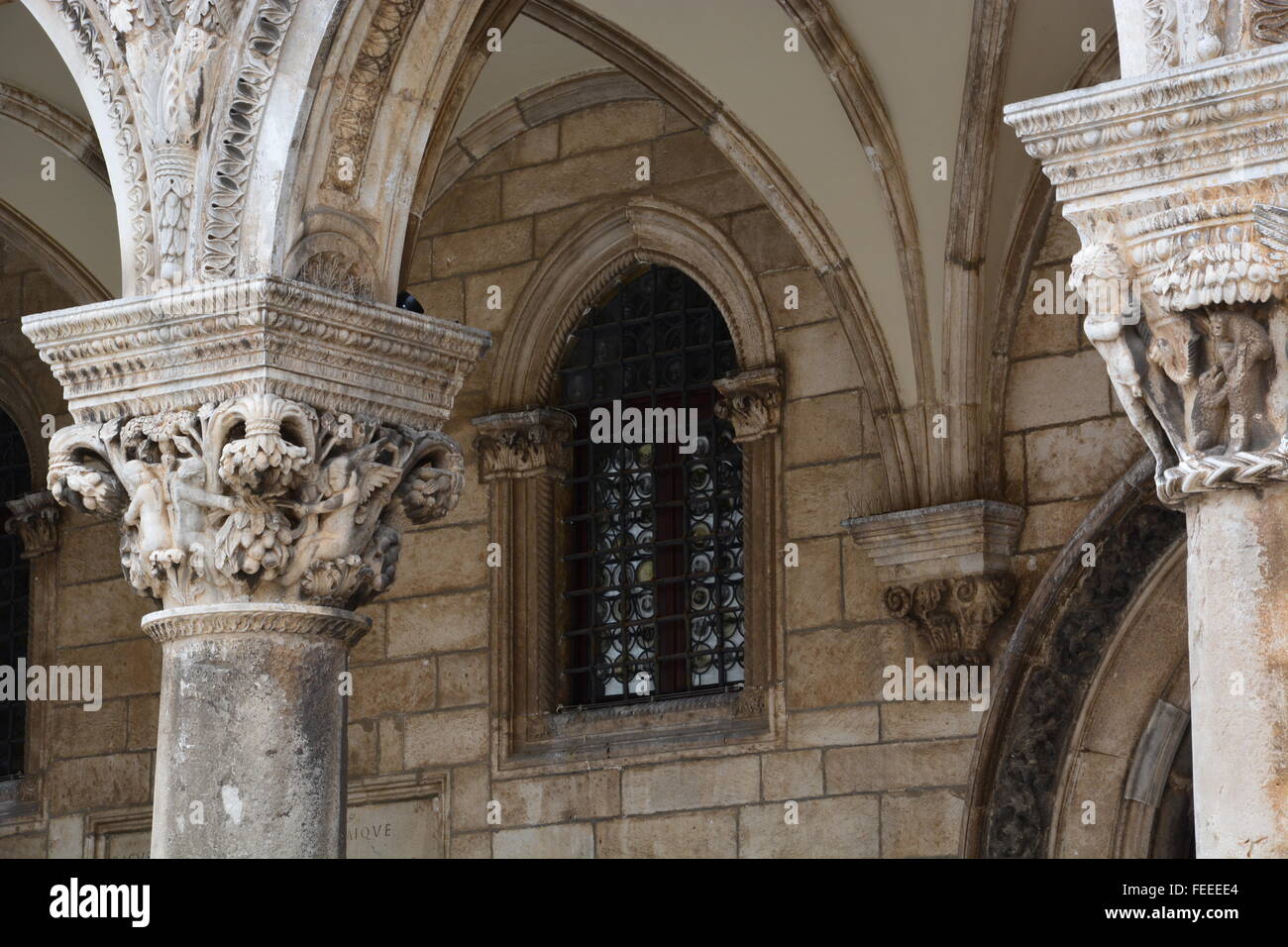 The stone columns and arches of the Rector's Palace in the Old City of ...