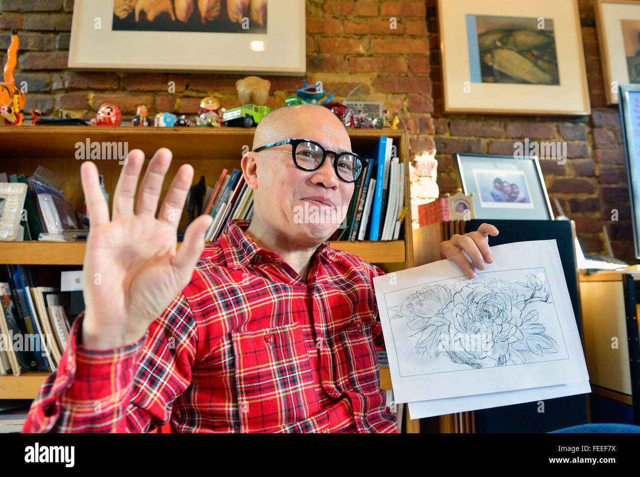 New York, USA. 21st Jan, 2016. Kam Mak shows the sketch of the Year of ...