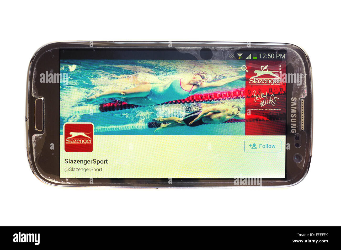 The Slazenger Twitter page on a smartphone screen photographed against ...