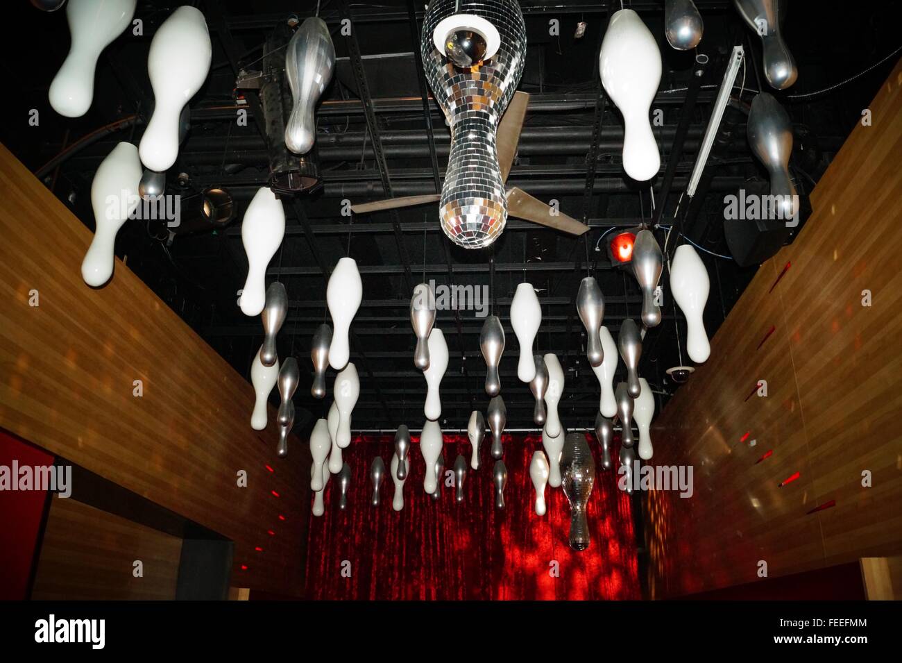 Bowling pins hanging from the ceiling at a bowling club in Manhattan ...